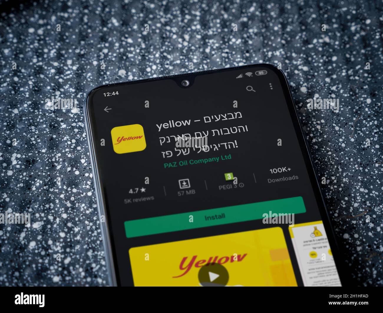 Lod, Israel - July 8, 2020: Yellow app play store page on the display ...