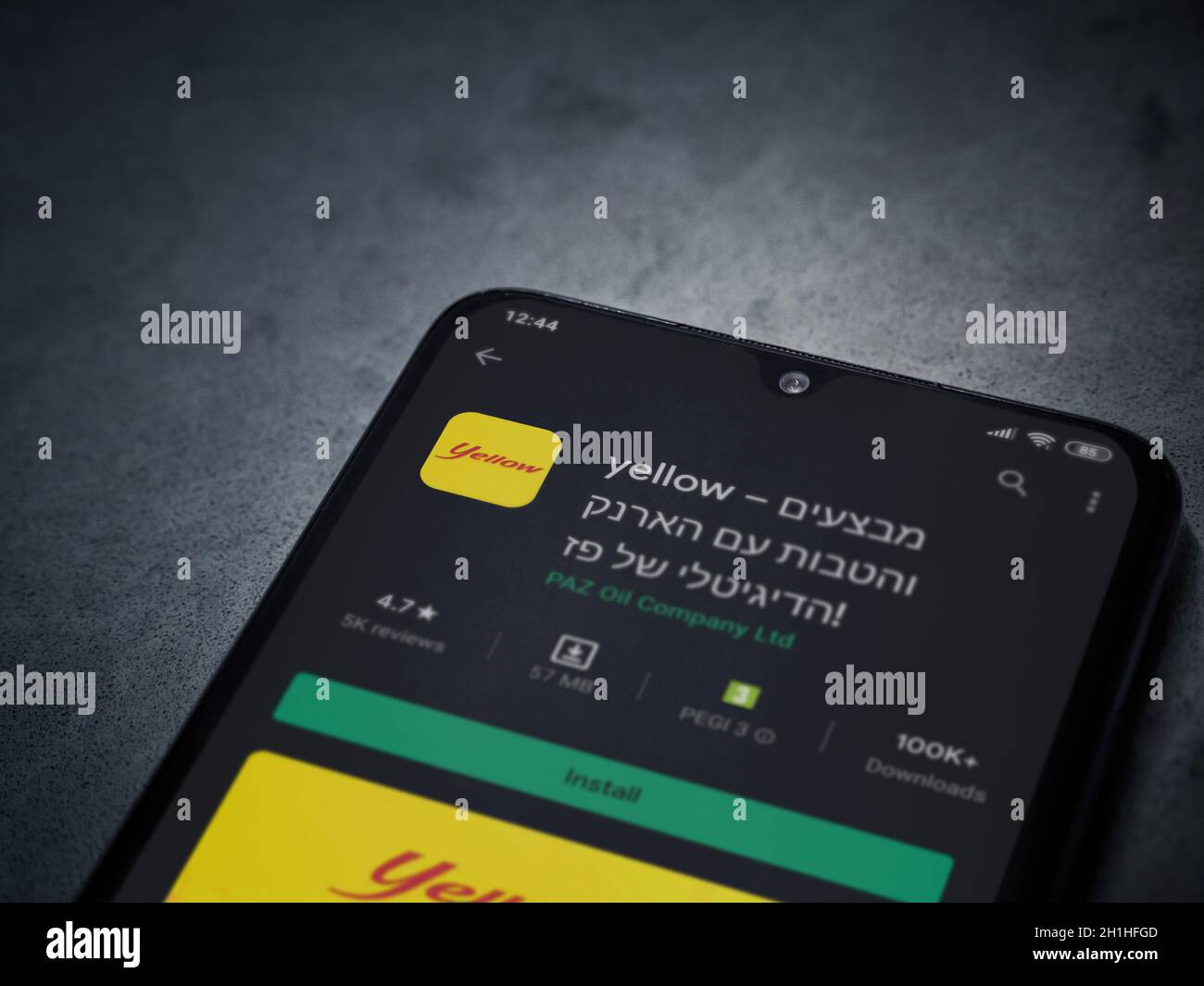 Lod, Israel - July 8, 2020: Yellow app play store page on the display ...