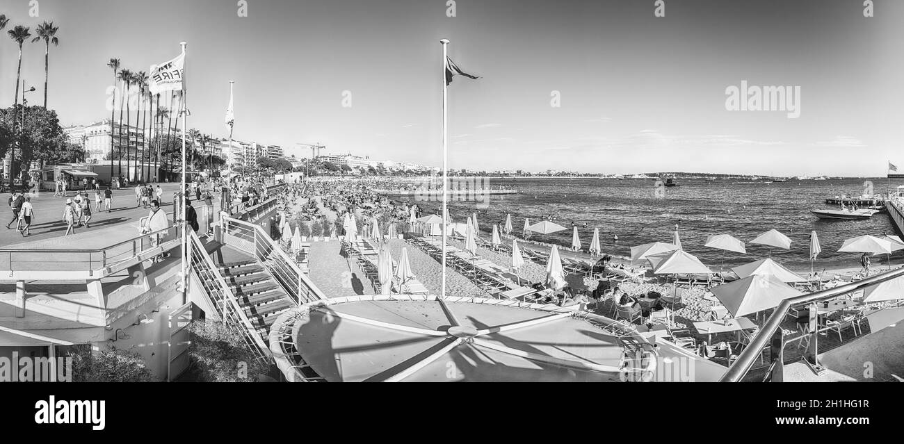 CANNES, FRANCE - AUGUST 15: People enjoying a sunny day on the beach in ...