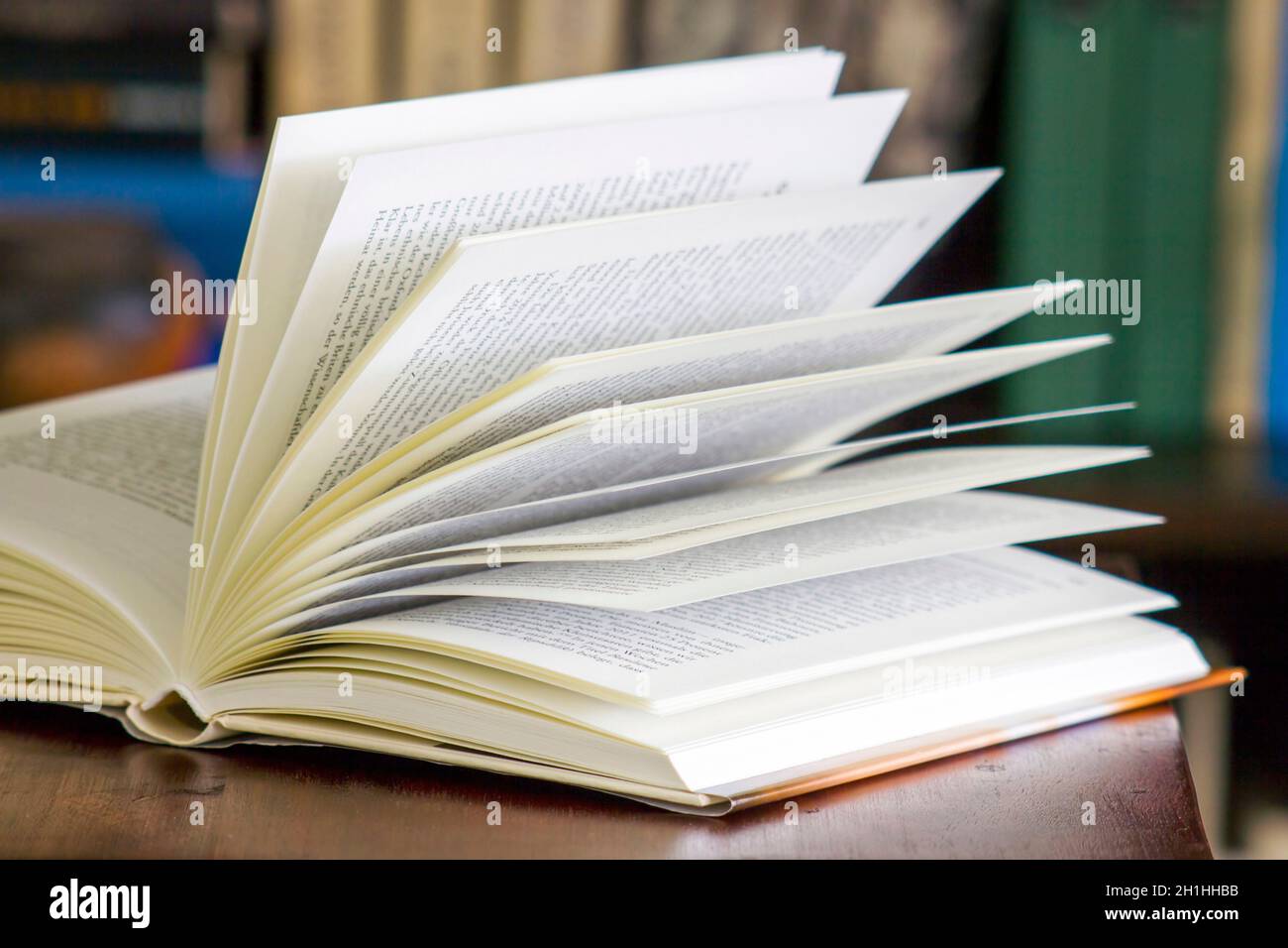 open book on the desk Stock Photo - Alamy