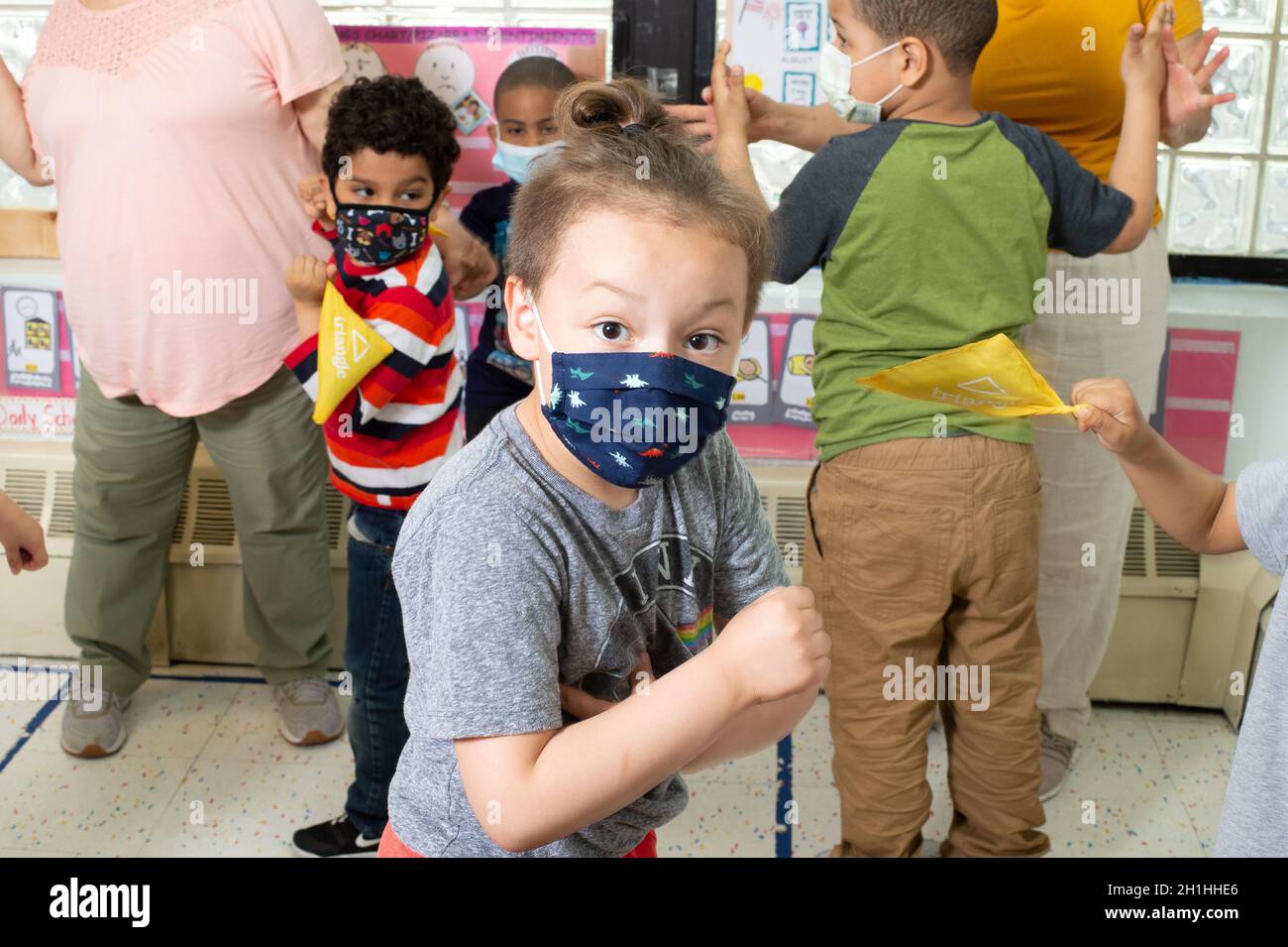 Education Preschool 4-5 year olds group doing music activity and ...