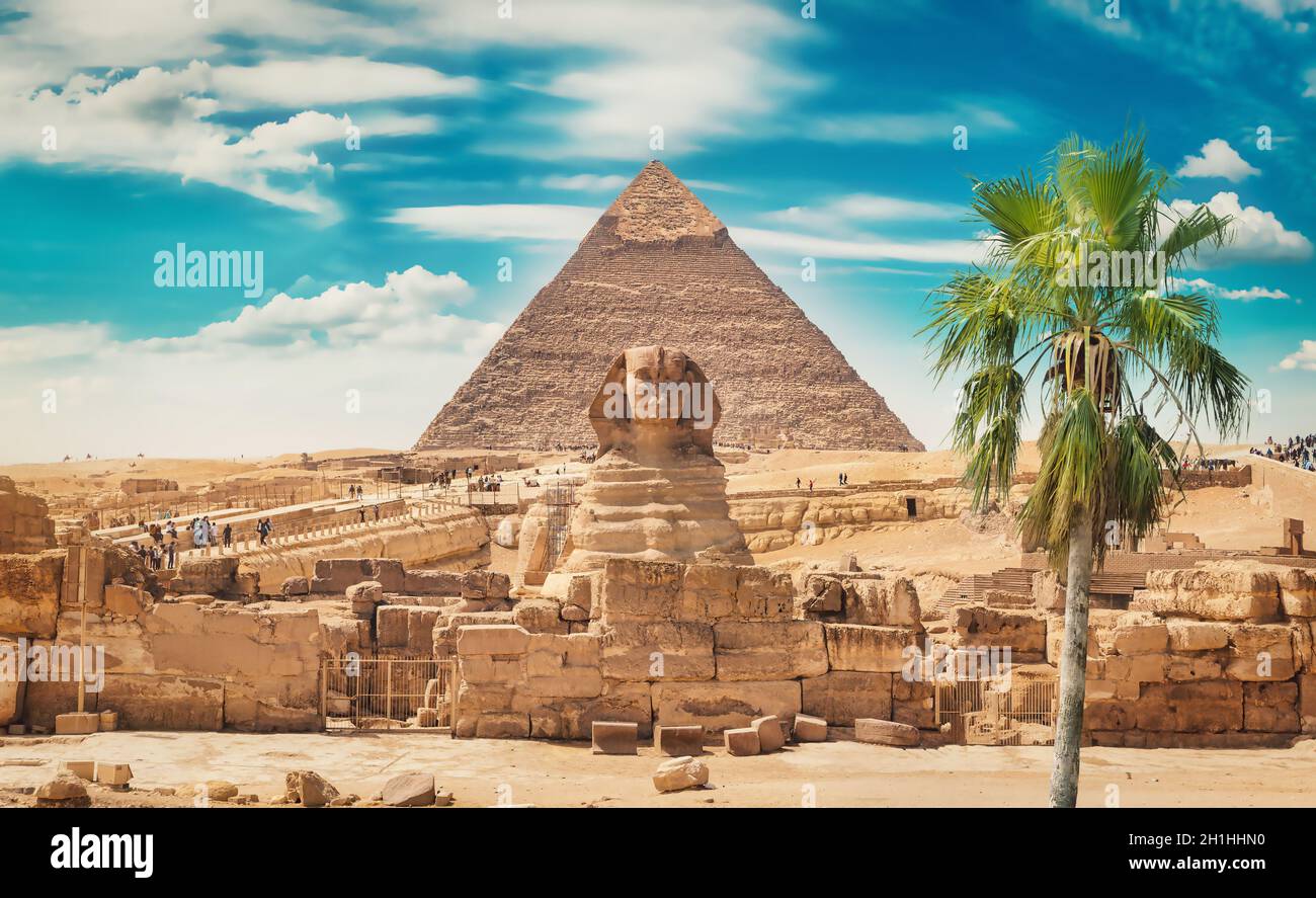 Sphinx and pyramid in the egyptian desert Stock Photo - Alamy