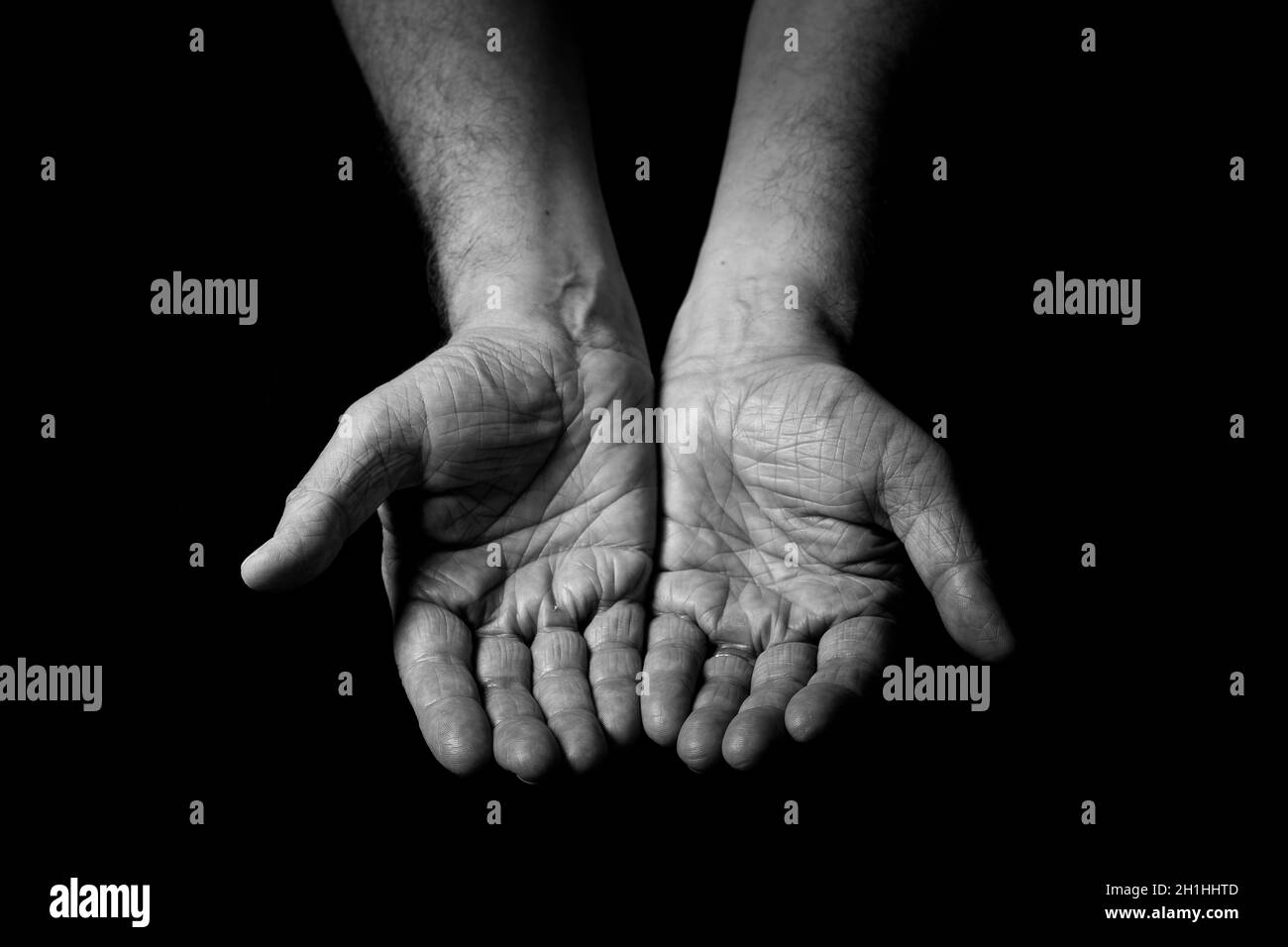 Man begging hands hi-res stock photography and images - Alamy