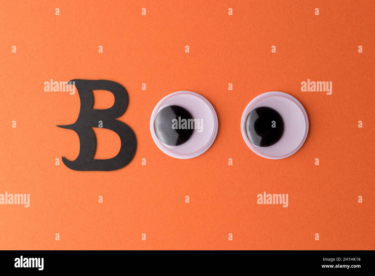 Word BOO made of black letter and googly eyes. Minimal Halloween ...
