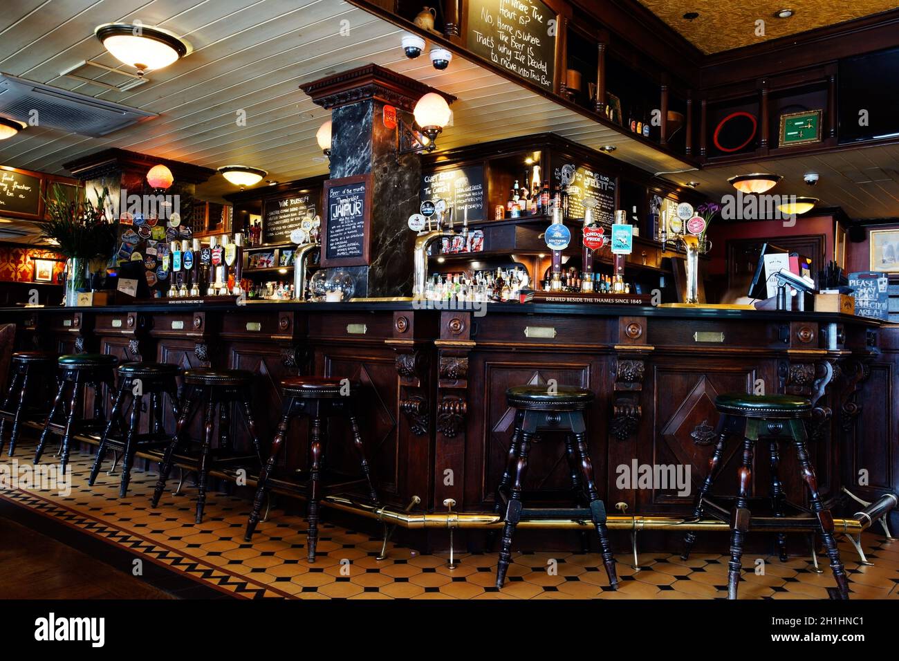 LONDON - April 26: Interior of pub, for drinking and socializing, focal ...