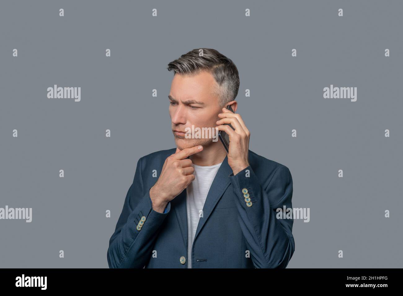 Serious pensive well dressed hi-res stock photography and images - Alamy