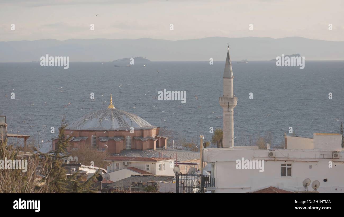 Mosque stands on background of sea. Action. Beautiful mosque on sea ...