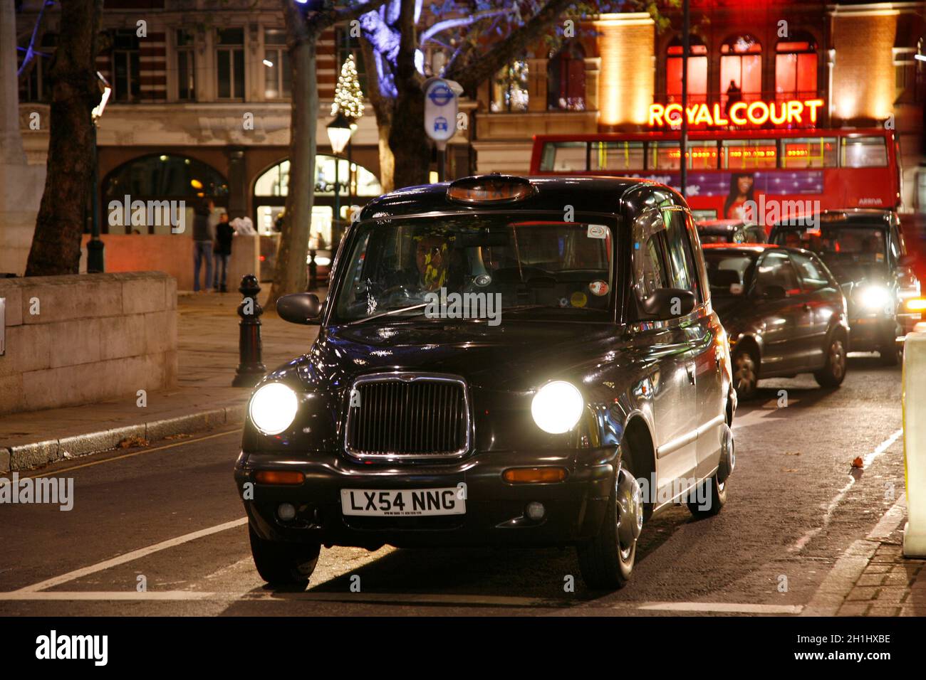 London, UK - November 30, 2011 : Taxi in the street of London. UK. Cabs ...