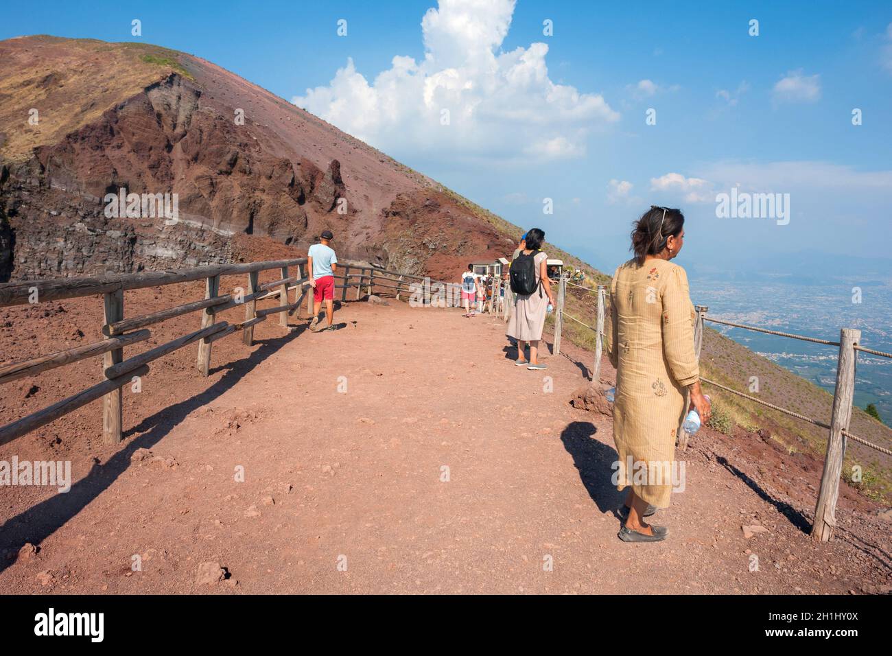 MOUNT VESUVIUS, ITALY - AUGUST 1, 2018: Tourists walk around the crater ...