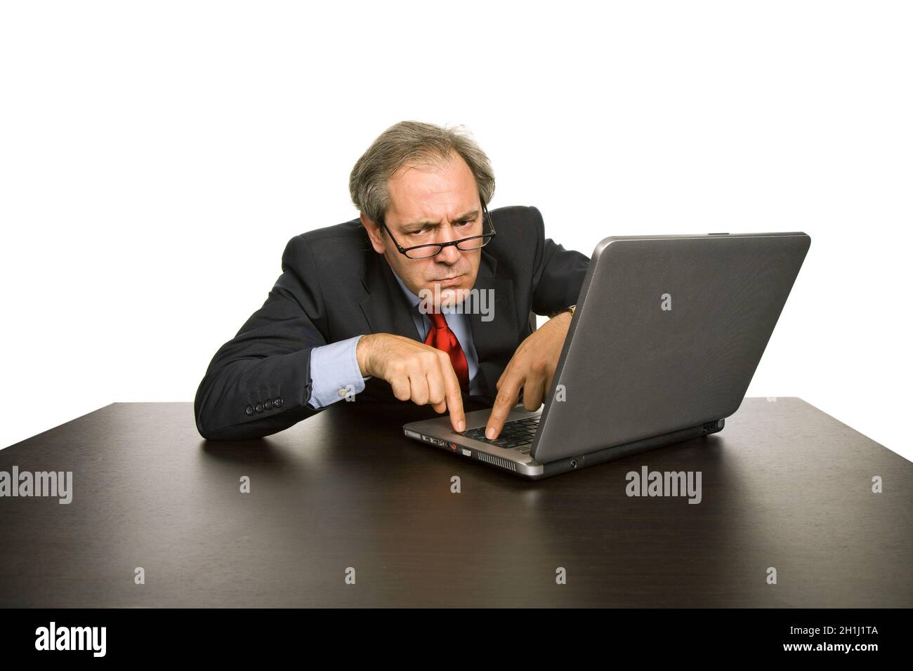 mature business man working with his laptop Stock Photo - Alamy