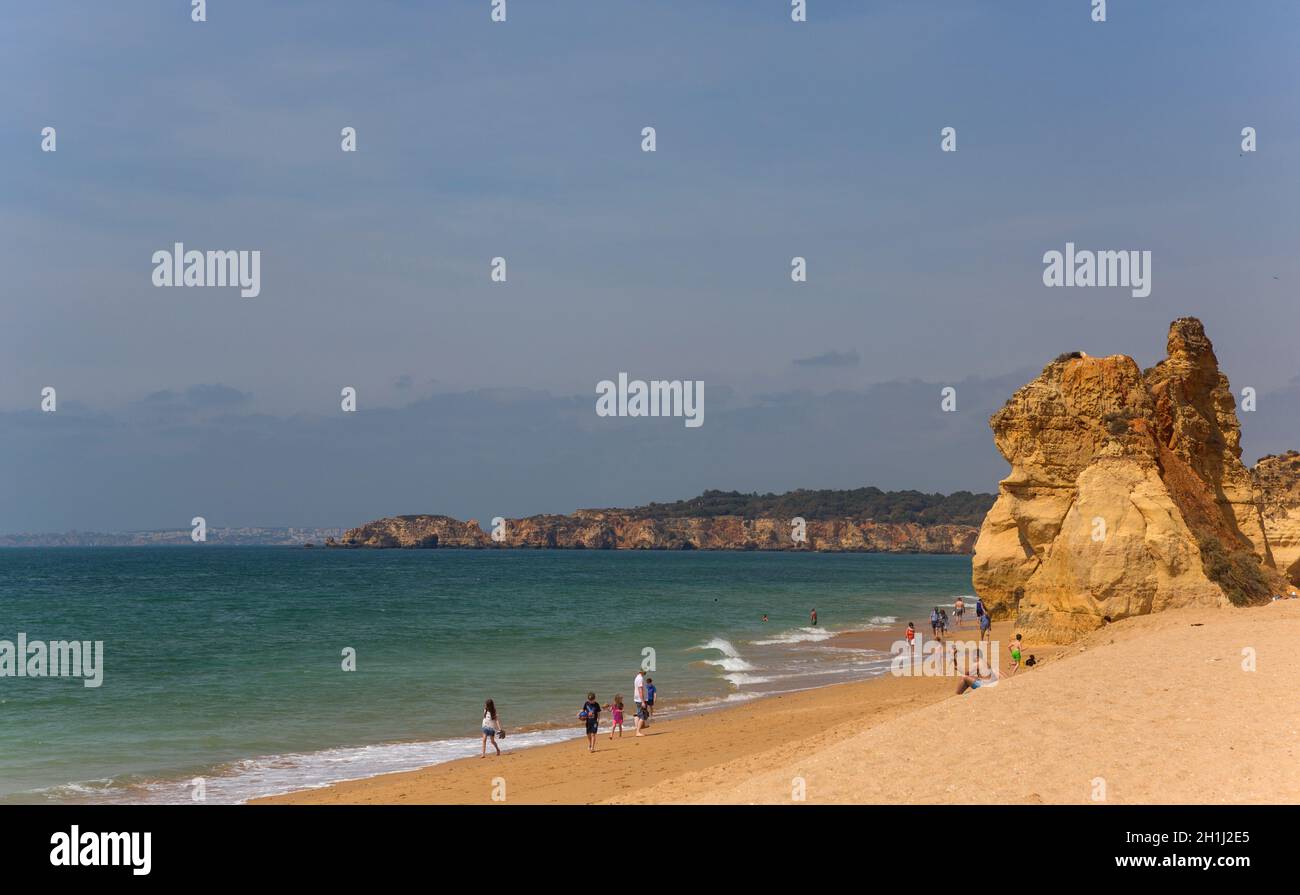 PRAIA DA ROCHA, PORTUGAL - APRIL 25, 2017: People at the famous beach ...