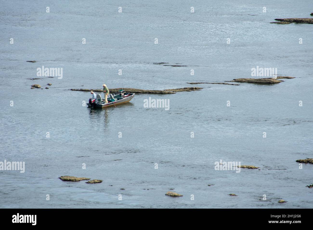 Two Men on a Small Fishing Boat on the Susquehanna River Near Historic ...