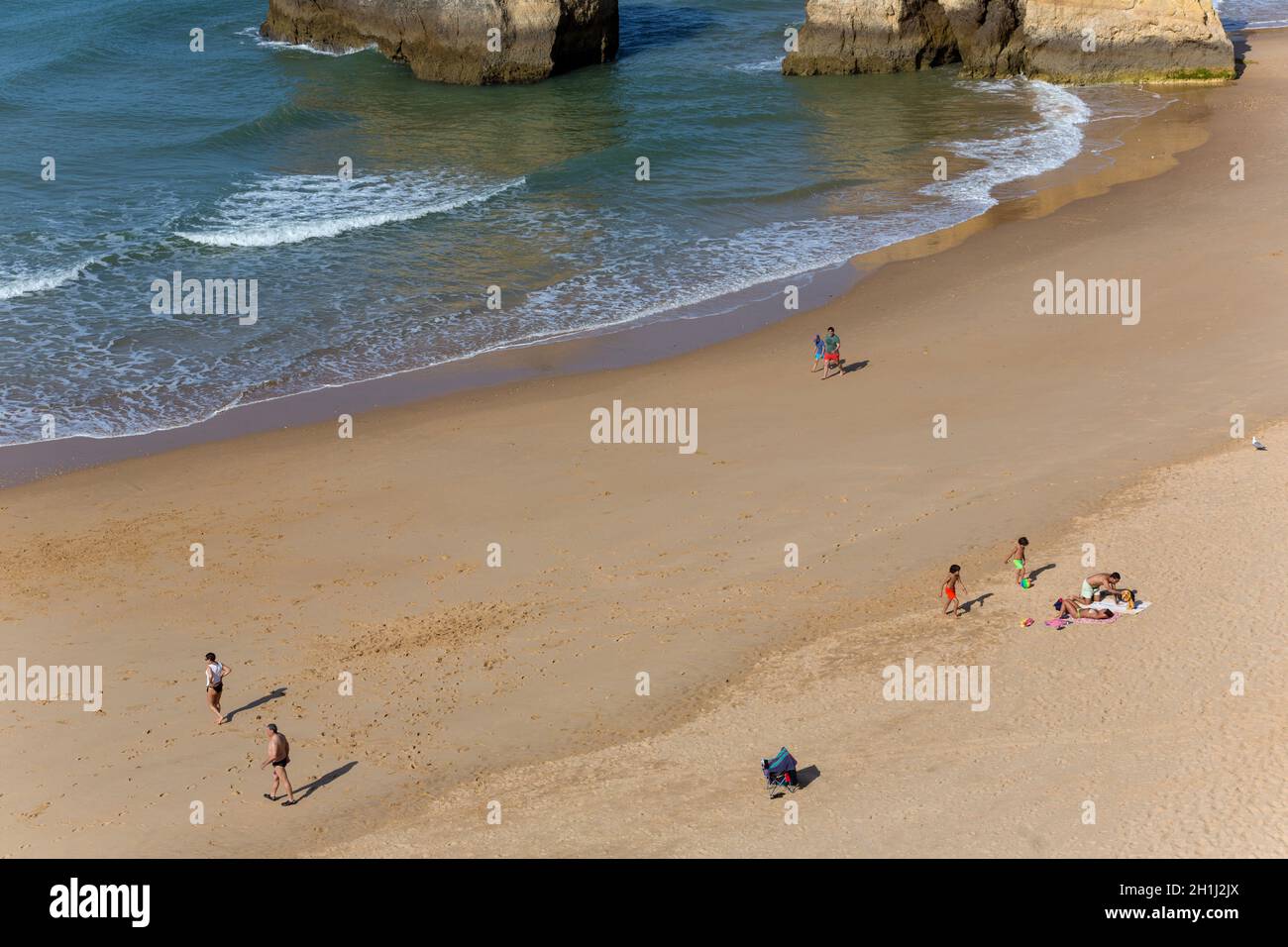 PRAIA DA ROCHA, PORTUGAL - APRIL 23, 2017: People at the famous beach ...
