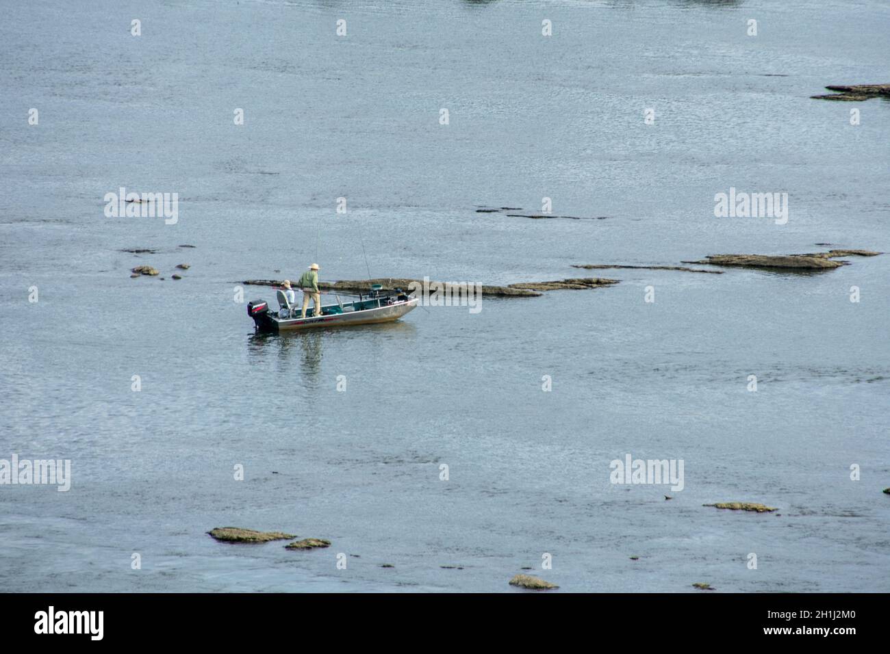 Two Men on a Small Fishing Boat on the Susquehanna River Near Historic ...