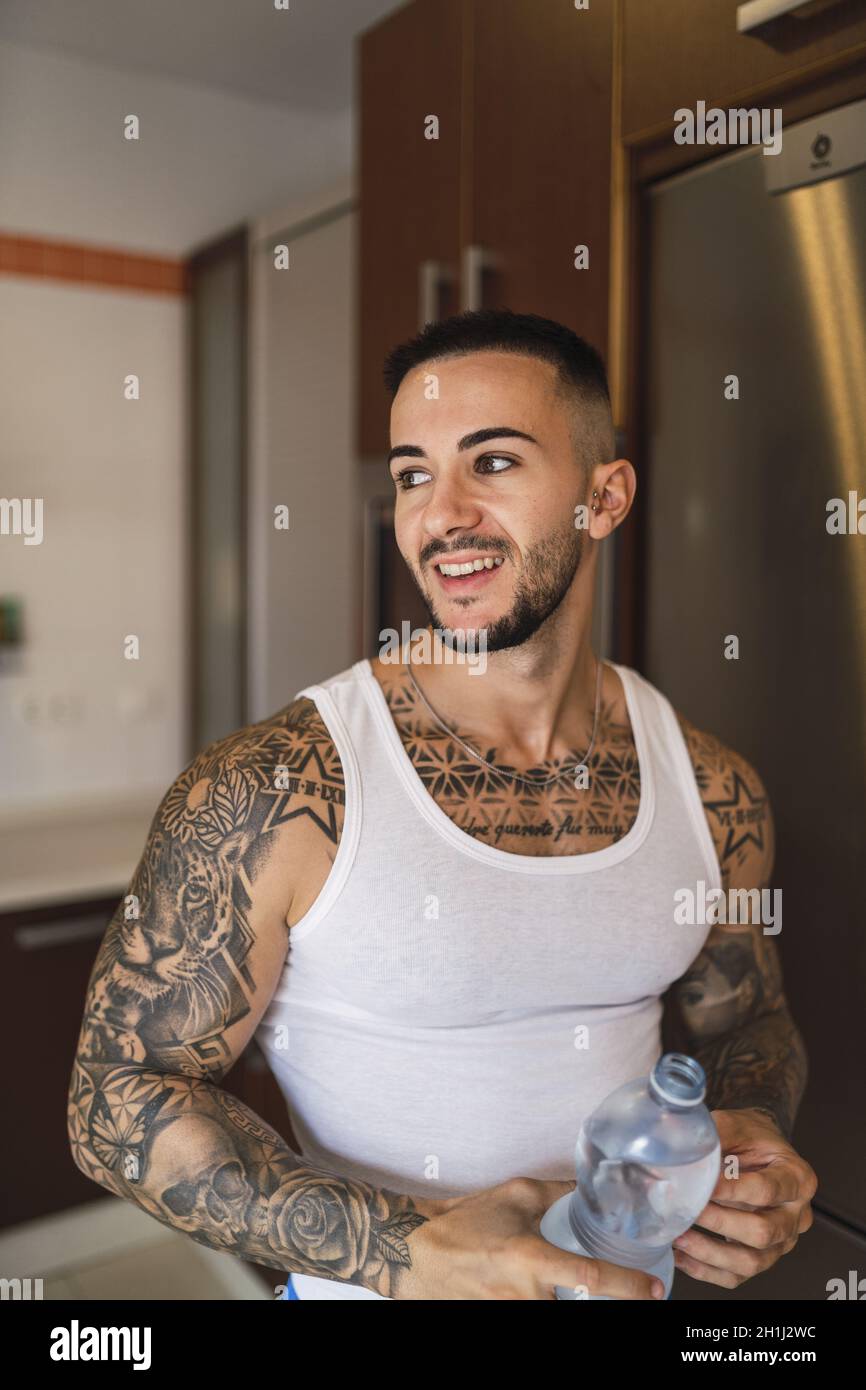 Handsome guy tattooed body hi-res stock photography and images - Alamy