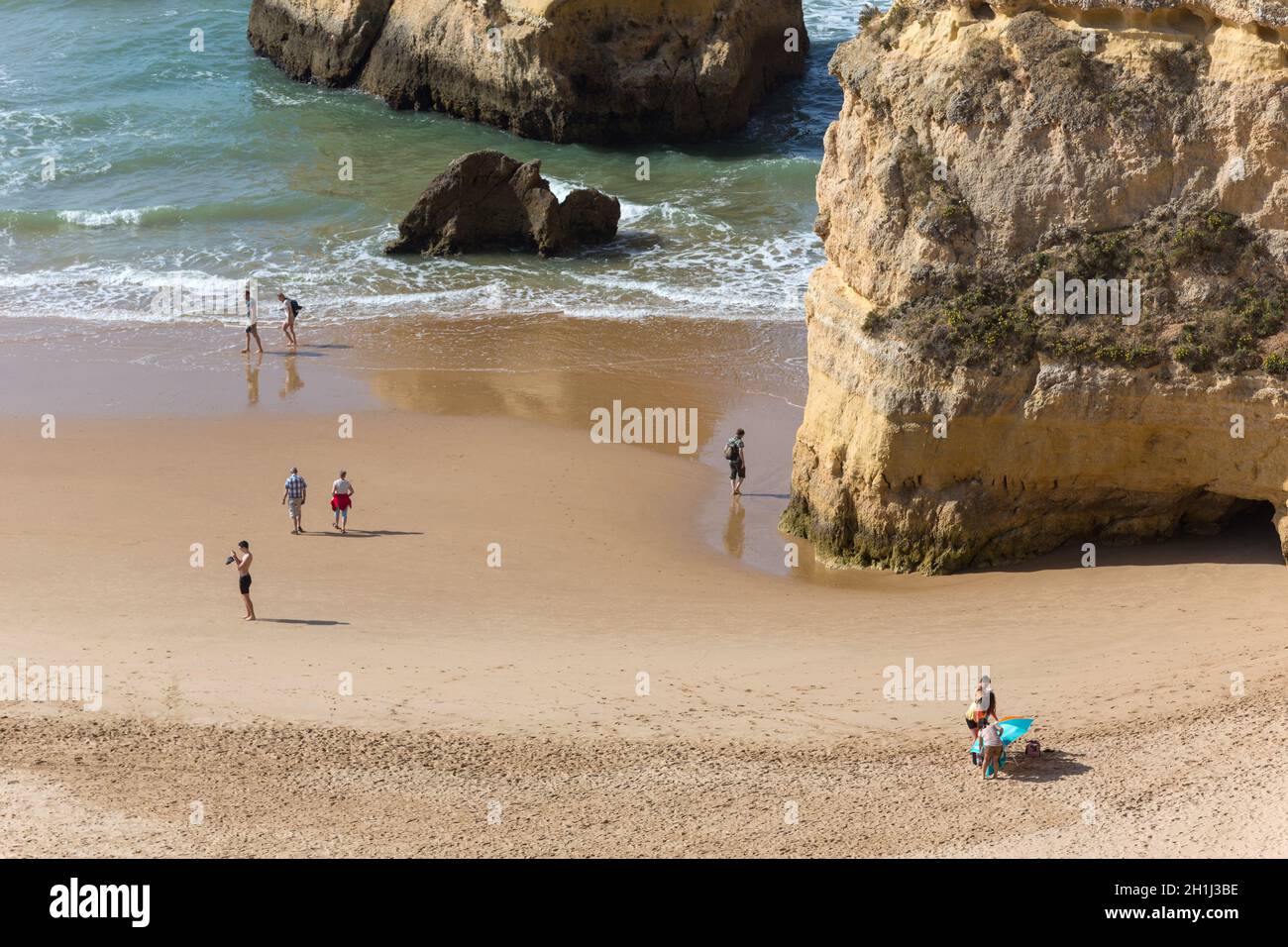 PRAIA DA ROCHA, PORTUGAL - APRIL 23, 2017: People at the famous beach ...