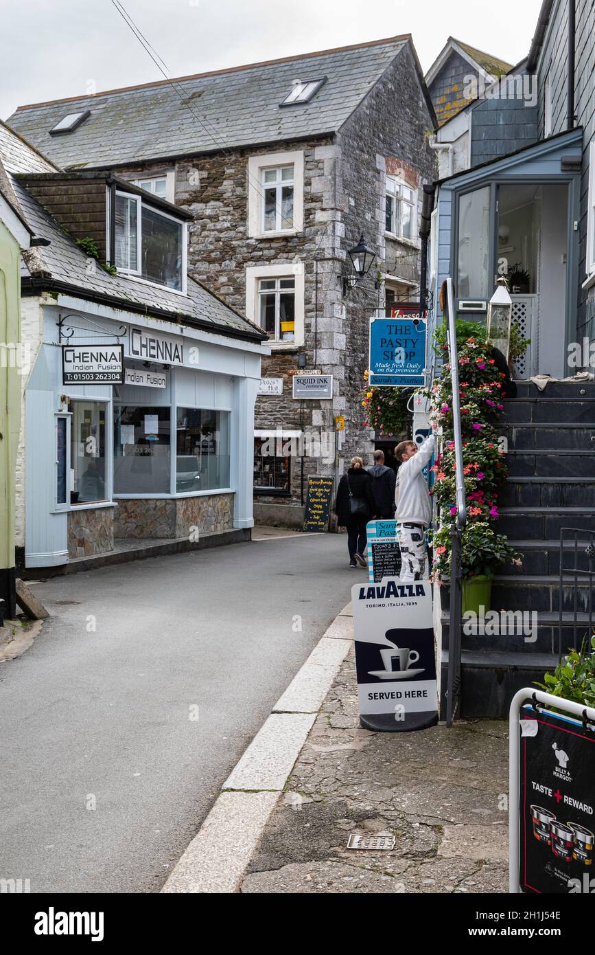 Buller Street, a narrow street in Looe, Cornwall. A working fishing ...