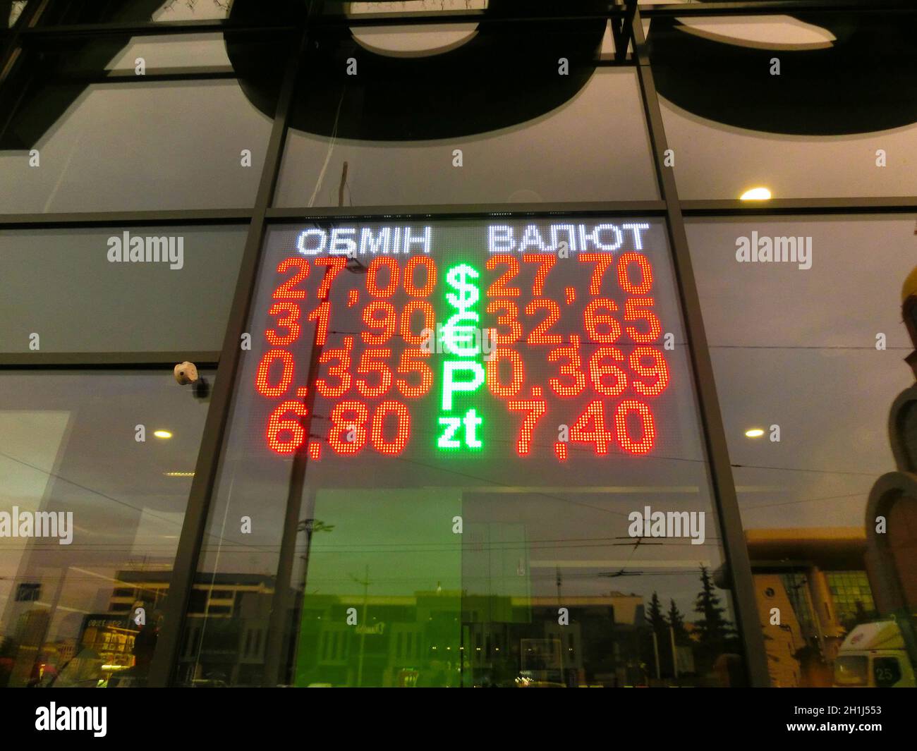Glowing sign - currency exchange- next to a currency exchange point is ...