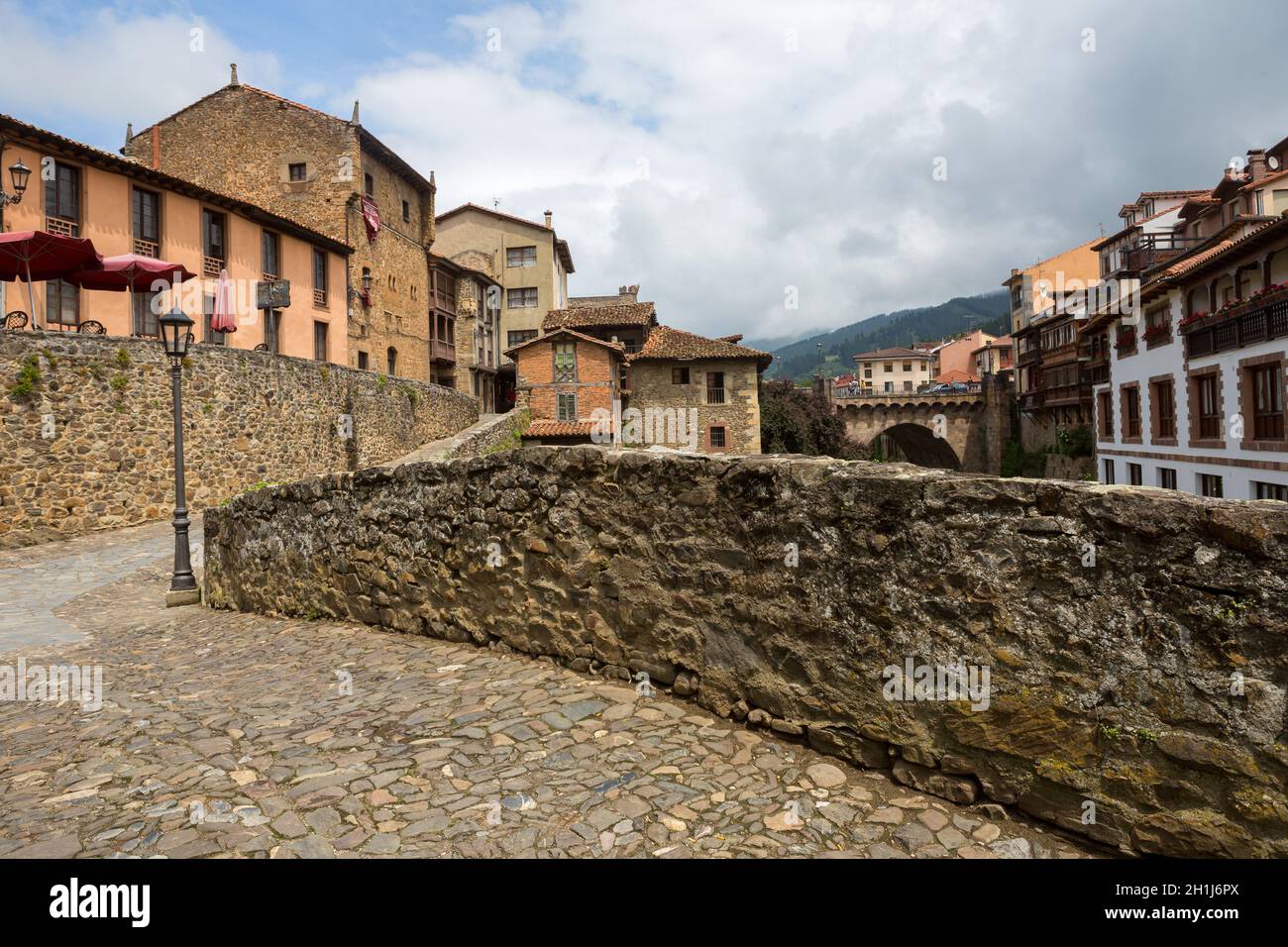 Potes, Spain - June 1, 2018: The traditional houses in the ancient ...