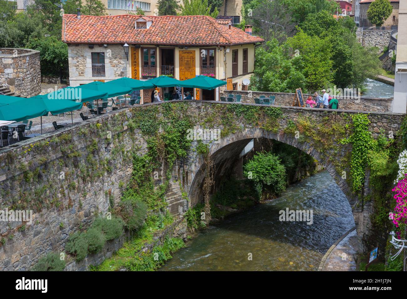 Potes, Spain - June 1, 2018: The traditional houses in the ancient ...