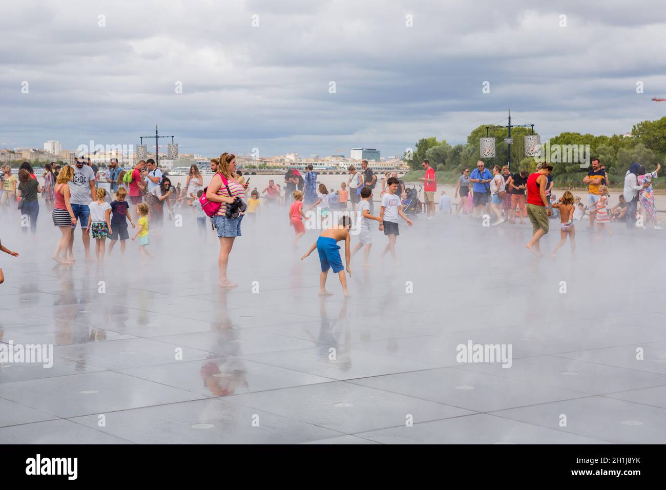 The Famous Bordeaux water mirror full of people having fun in the water ...