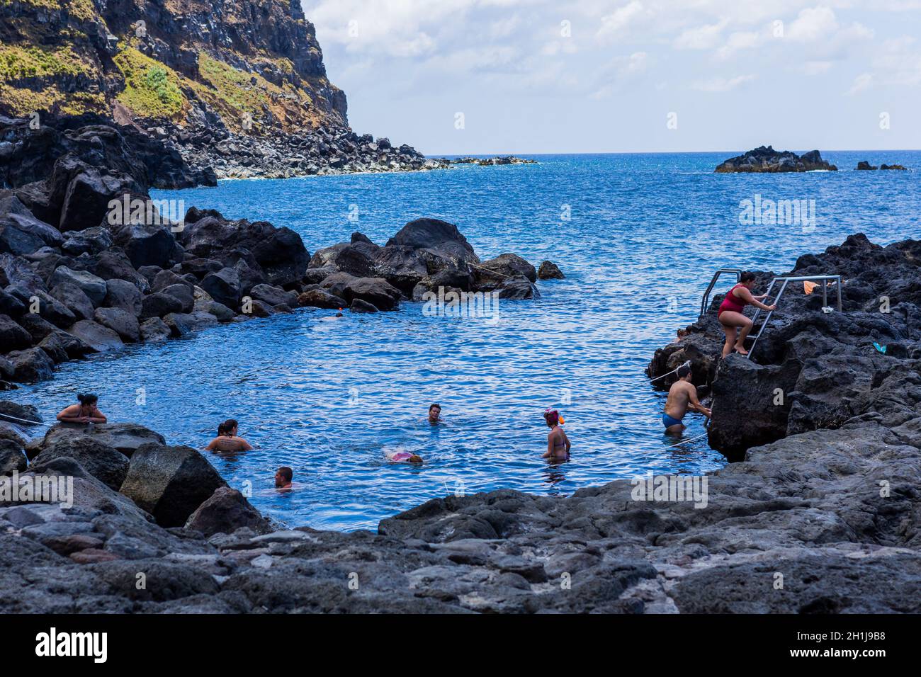 Ponta da Ferraria, Azores, Portugal - August 13, 2020: People bathing ...