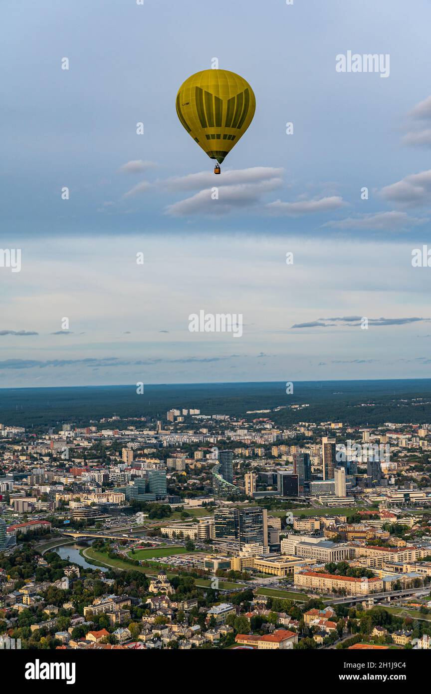Vilnius, Lithuania - September 14, 2021: Yellow hot air balloon takes ...