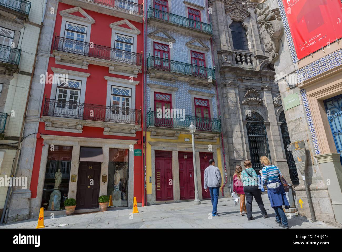 PORTO, PORTUGAL - April 17, 2017: People walking at Old Town street of ...