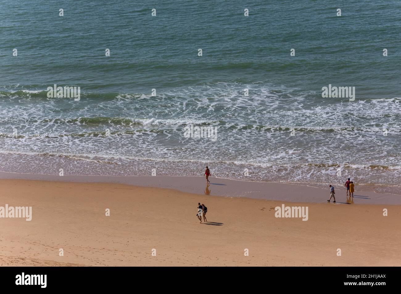 PRAIA DA ROCHA, PORTUGAL - APRIL 23, 2017: People at the famous beach ...