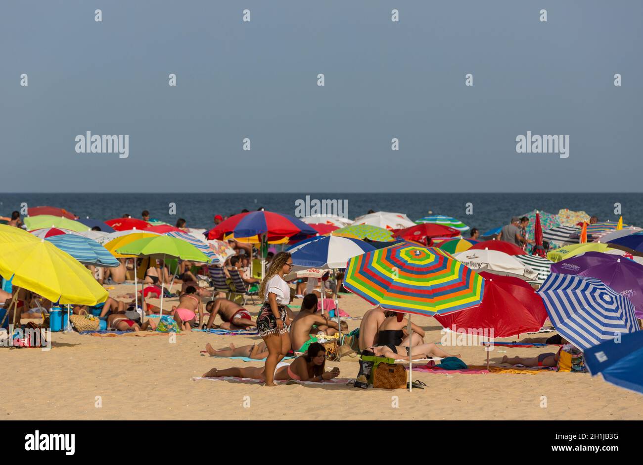 MANTA ROTA, PORTUGAL - AUGUST 25, 2017: People at the famous beach of ...