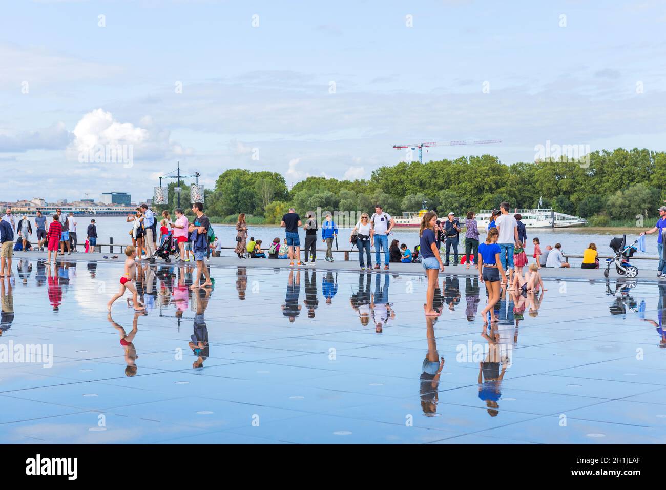 The Famous Bordeaux water mirror full of people having fun in the water ...