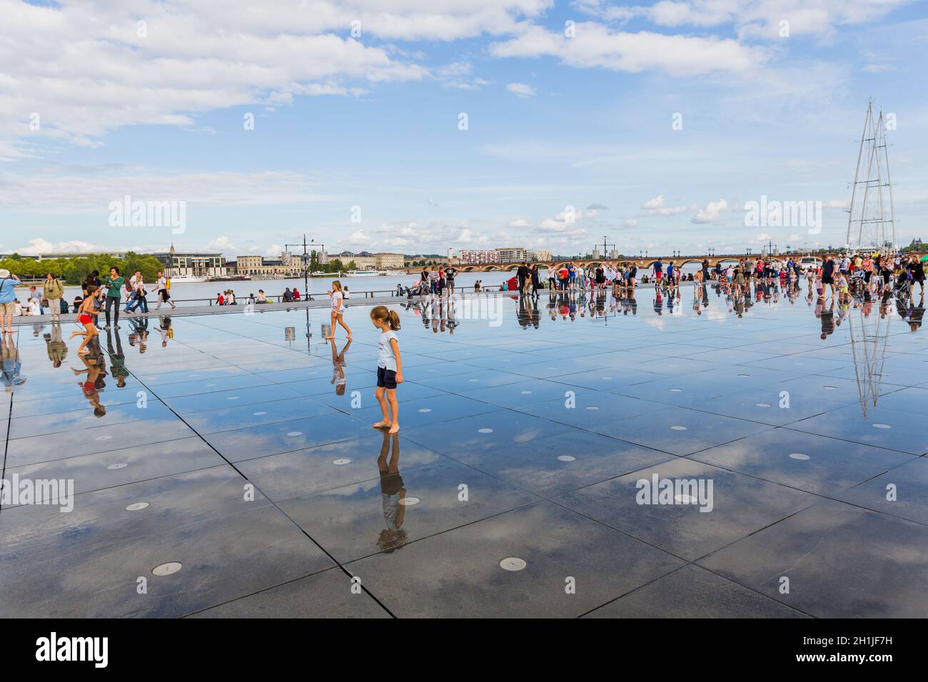 The Famous Bordeaux water mirror full of people having fun in the water ...