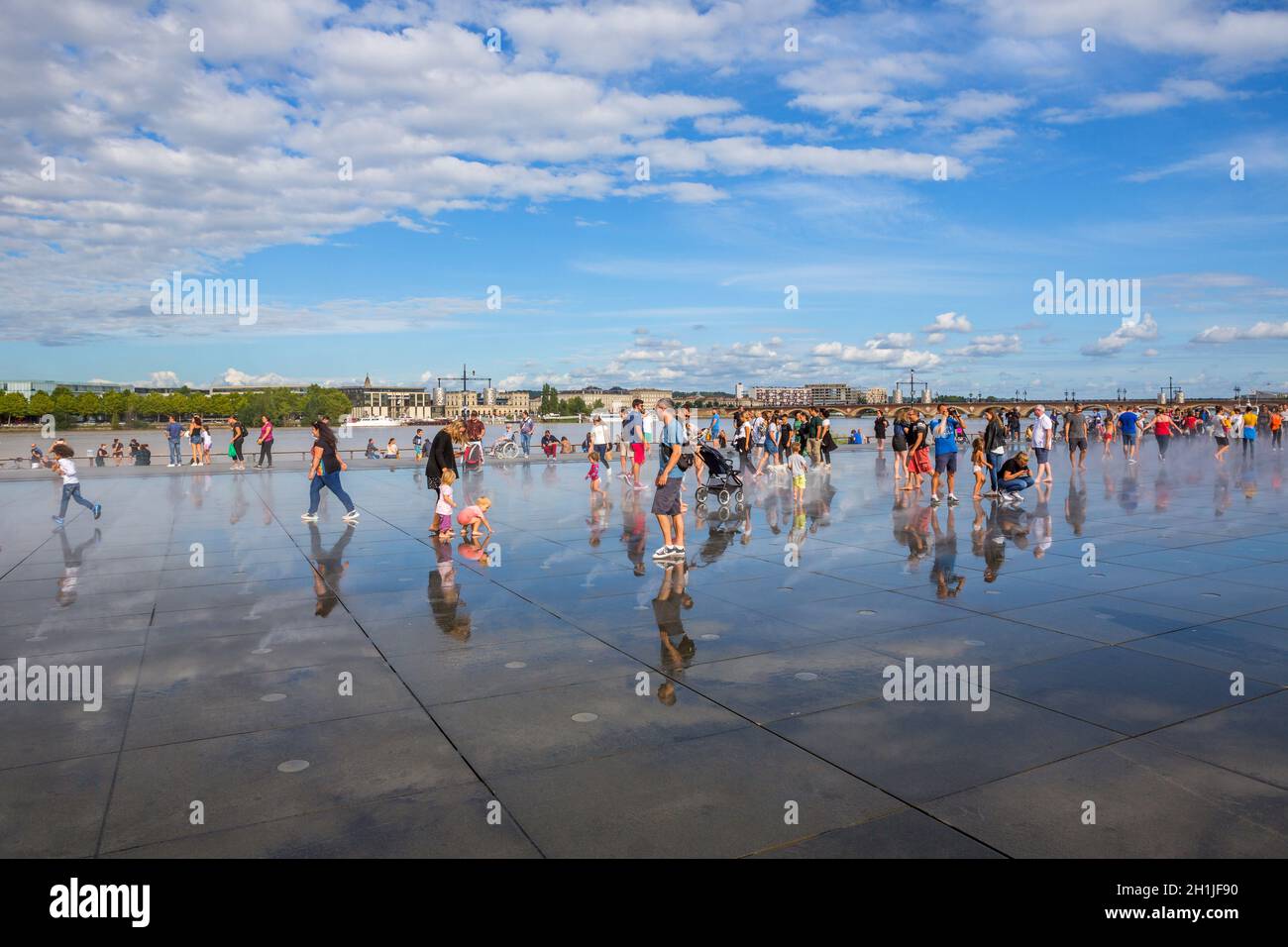 The Famous Bordeaux water mirror full of people having fun in the water ...