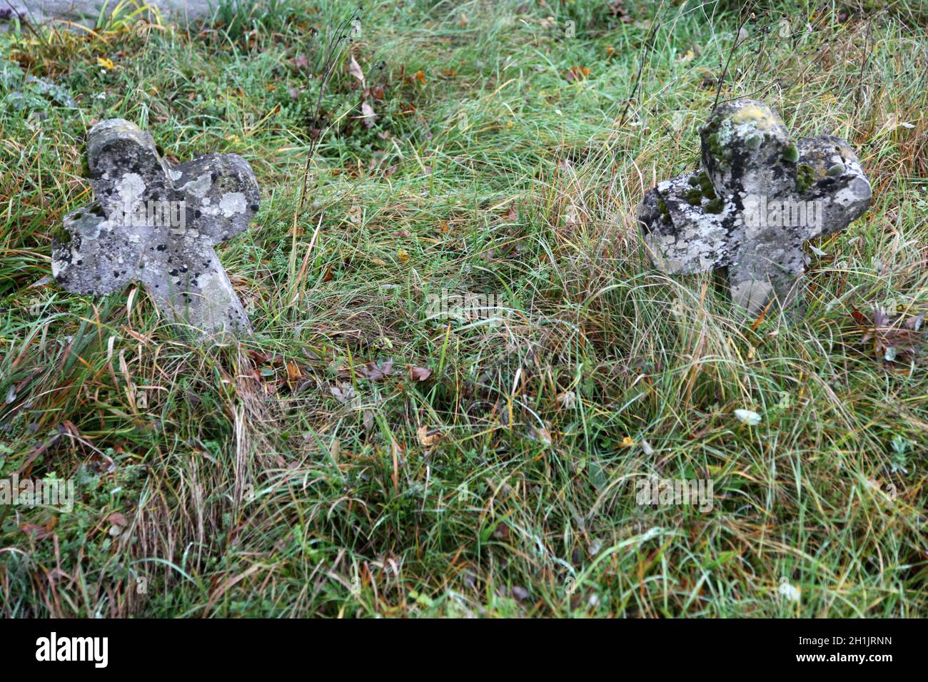 Stone cemetery cross Stock Photo - Alamy