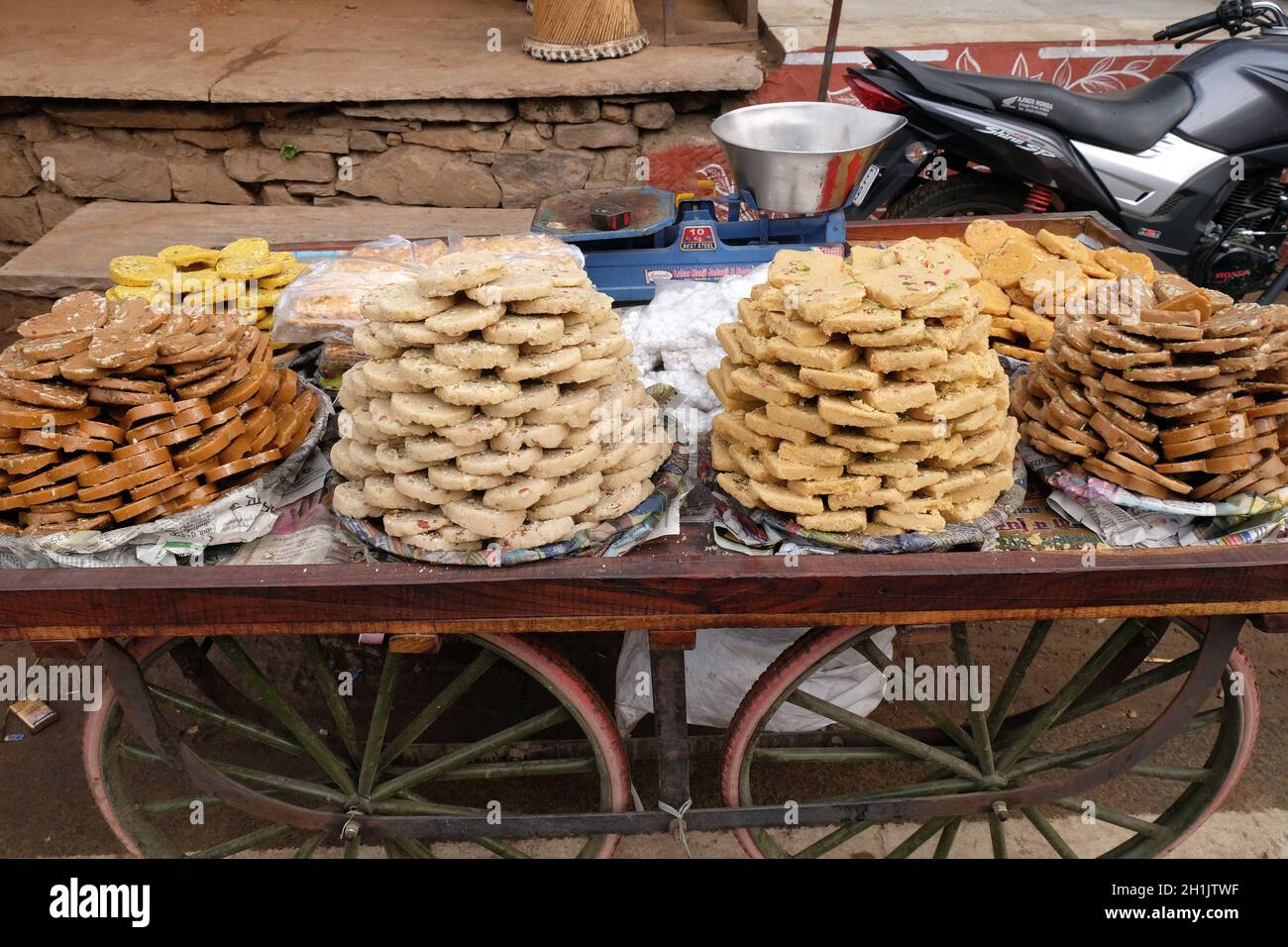 A street vendor selling sweets outside the Jagatpita Brahma Mandir Rama ...