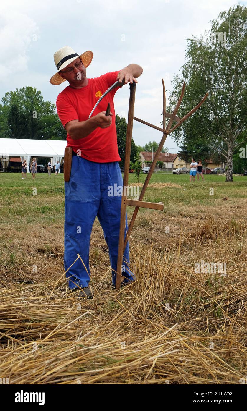 Farmer Sharpen Scythe High Resolution Stock Photography and Images - Alamy