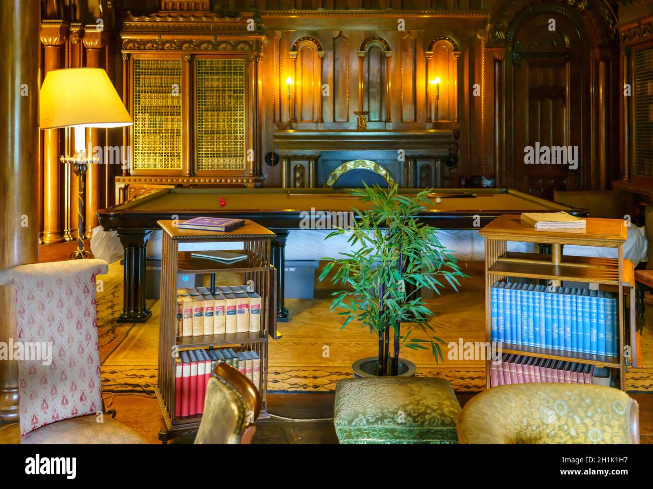 a beautifully appointed library room at Penrhyn Castle, an extensive ...