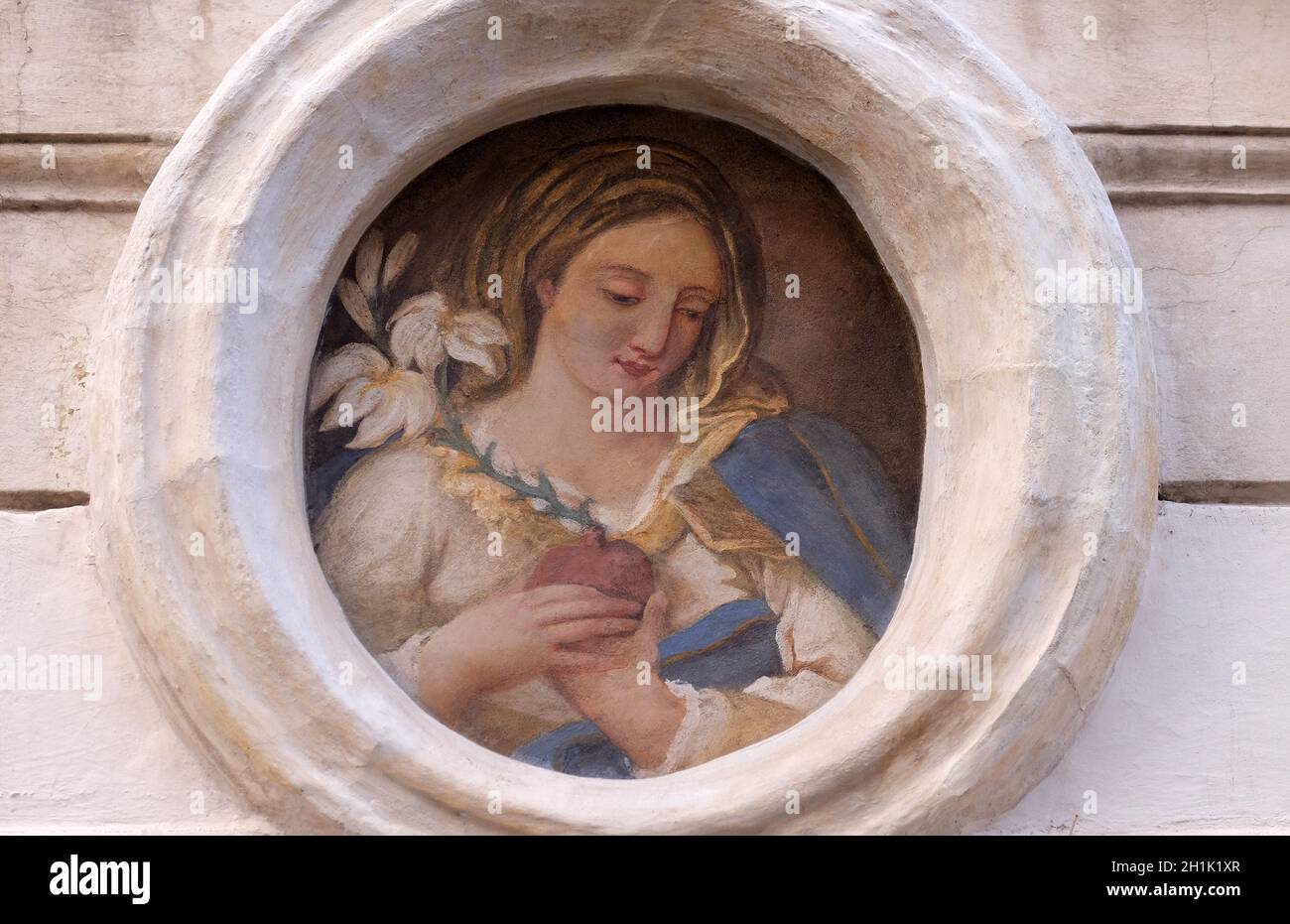 Image of Virgin Mary on the facade of a palace in Rome, Italy Stock ...