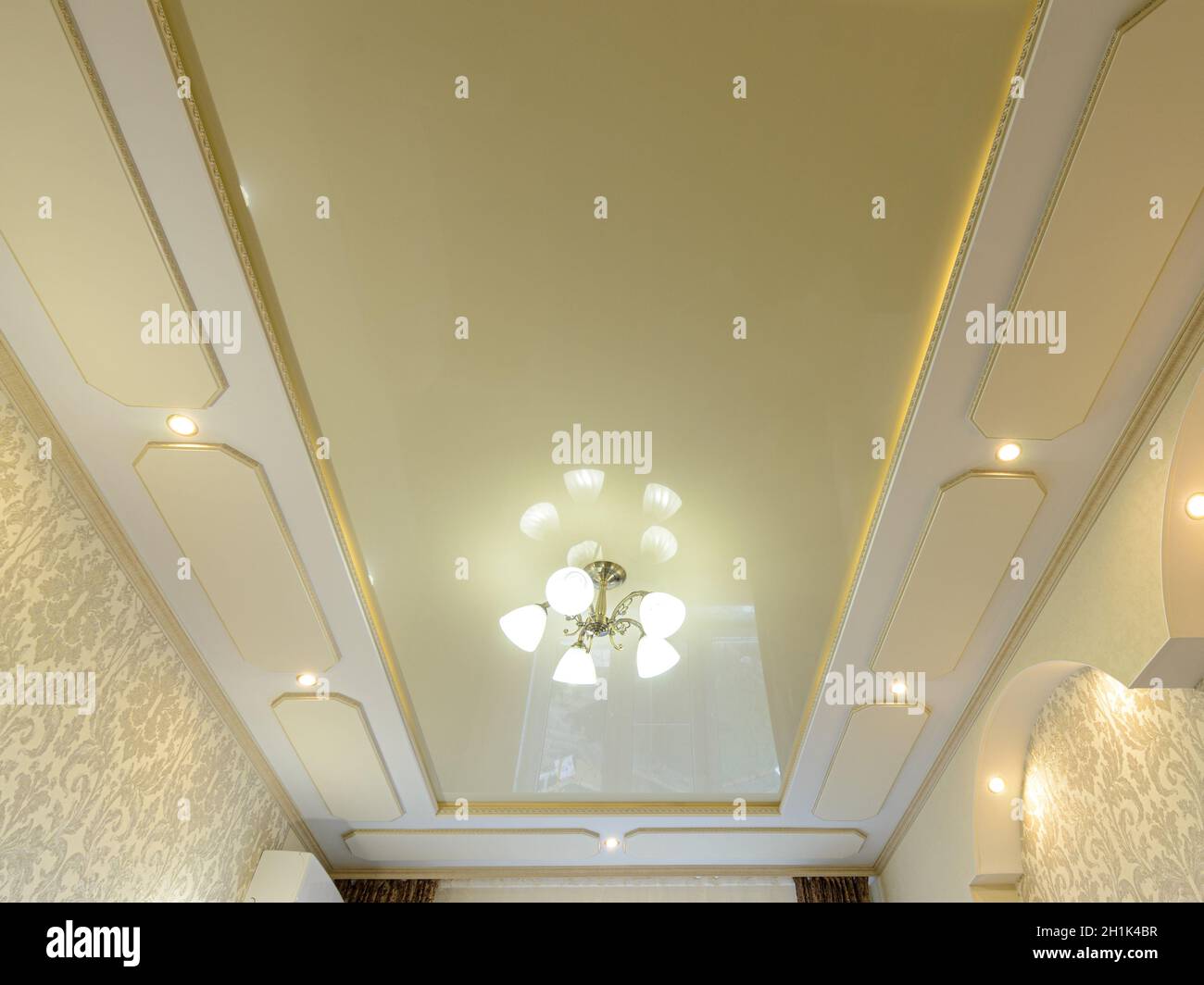 Very beautiful golden ceiling in the interior of the apartment Stock ...