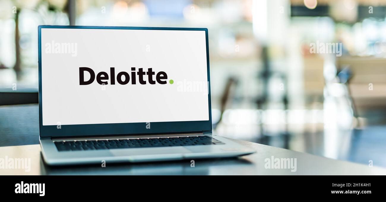 POZNAN, POL - SEP 23, 2020: Laptop computer displaying logo of Deloitte ...