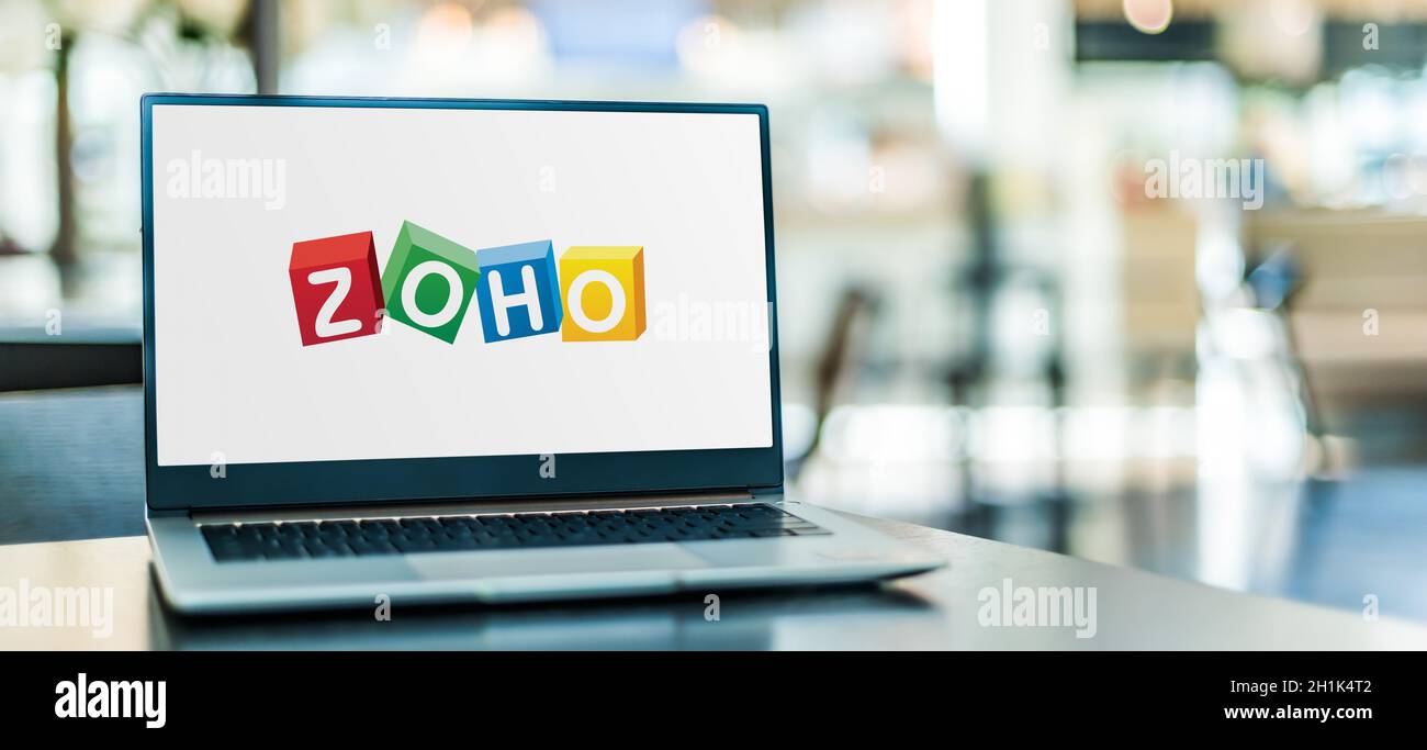 POZNAN, POL - SEP 23, 2020: Laptop computer displaying logo of Zoho ...