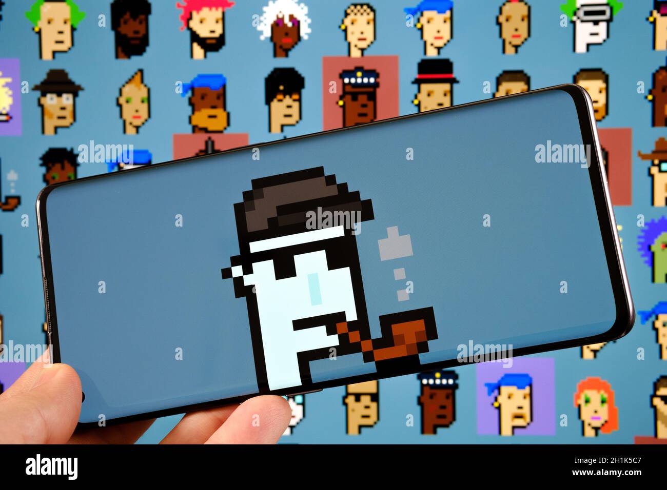 CryptoPunk #7804 NFT pixel art seen on smarphone and part of 10000 ...