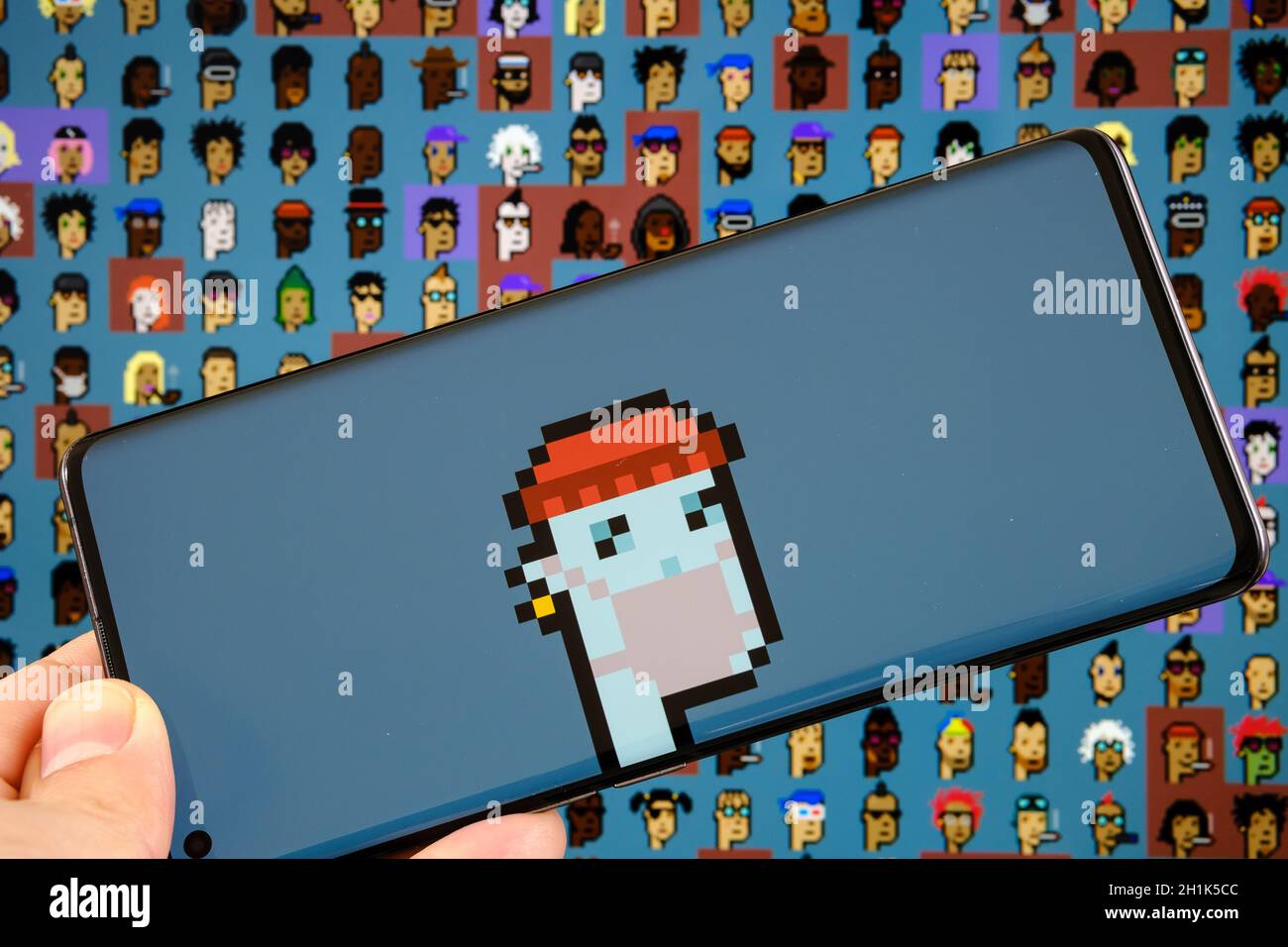 CryptoPunk #7523 NFT pixel art seen on smarphone and part of 10000 ...