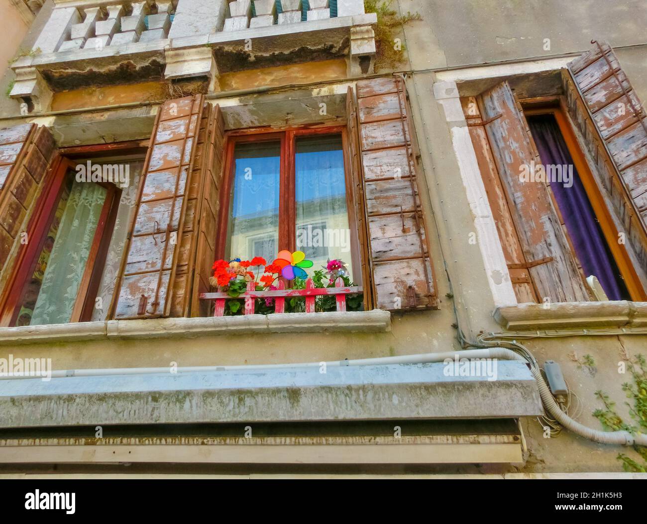 Beautiful view of colorful facades of old medieval houses in Venice ...