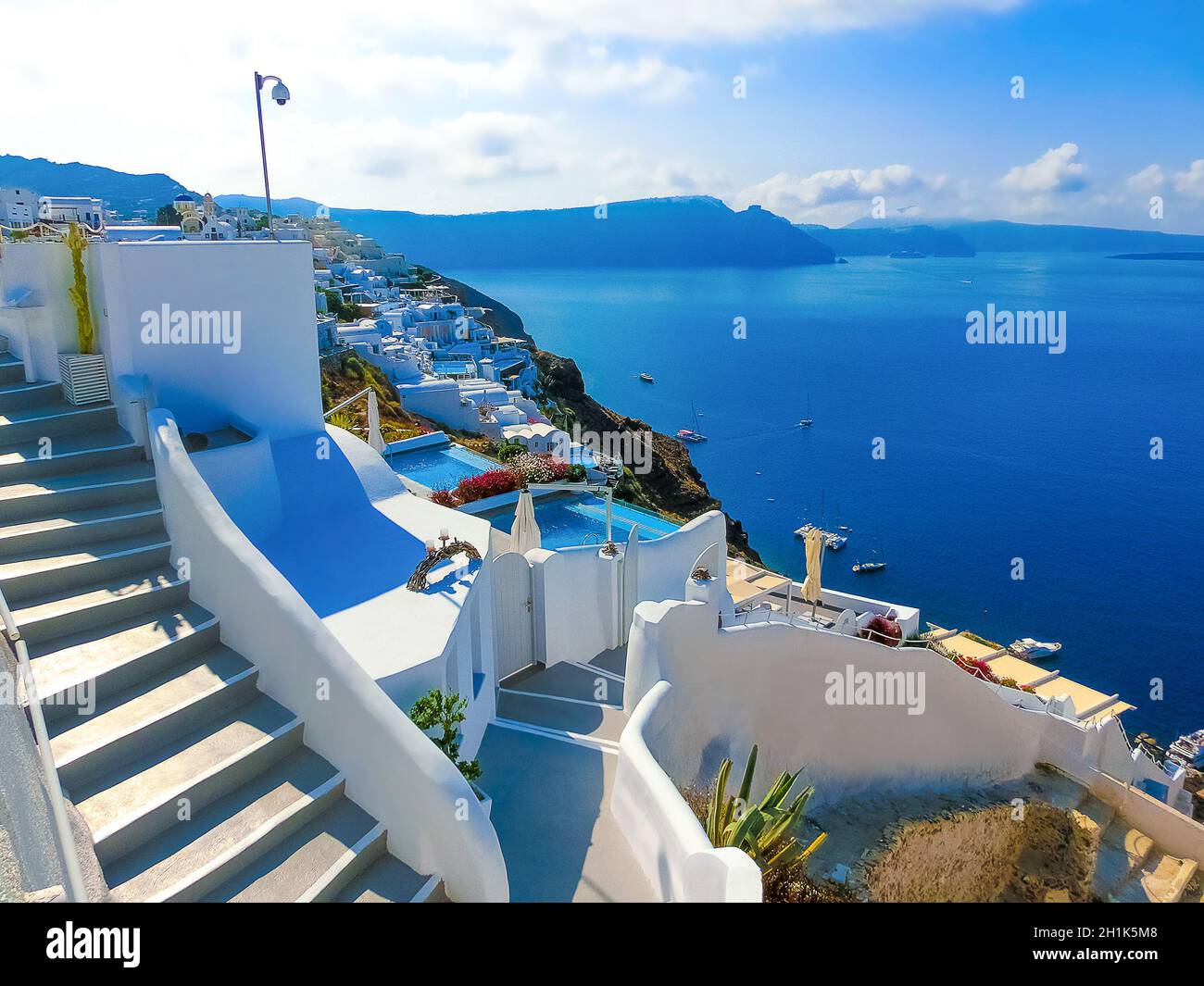 View to the sea from stairs in Oia the most beautiful village of ...
