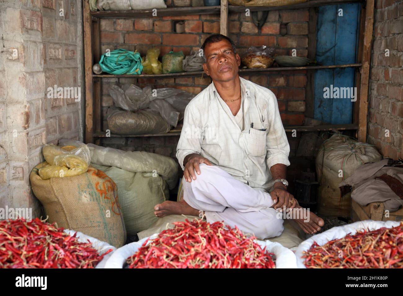 Indian man small rural shop hi-res stock photography and images - Alamy