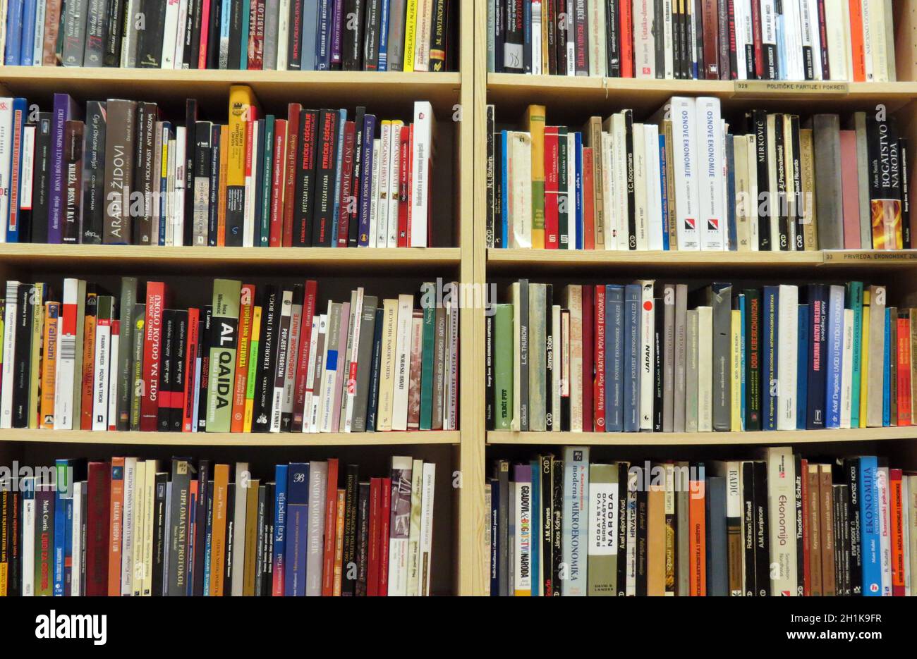 Bookshelf in library Stock Photo - Alamy