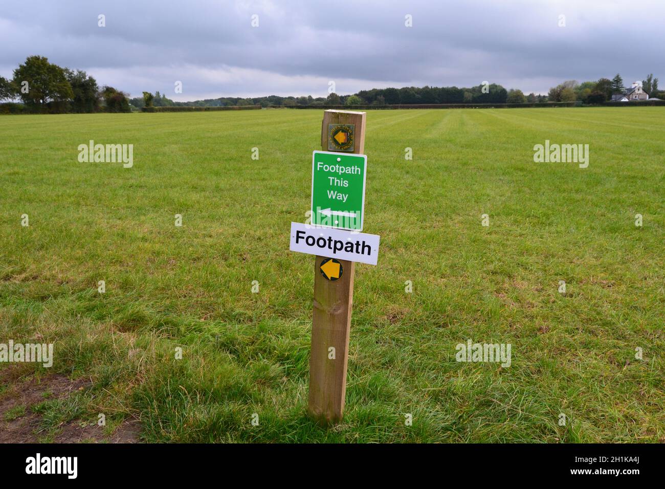 Footpath sign for path around a field, Downe, in Kent, facing south ...