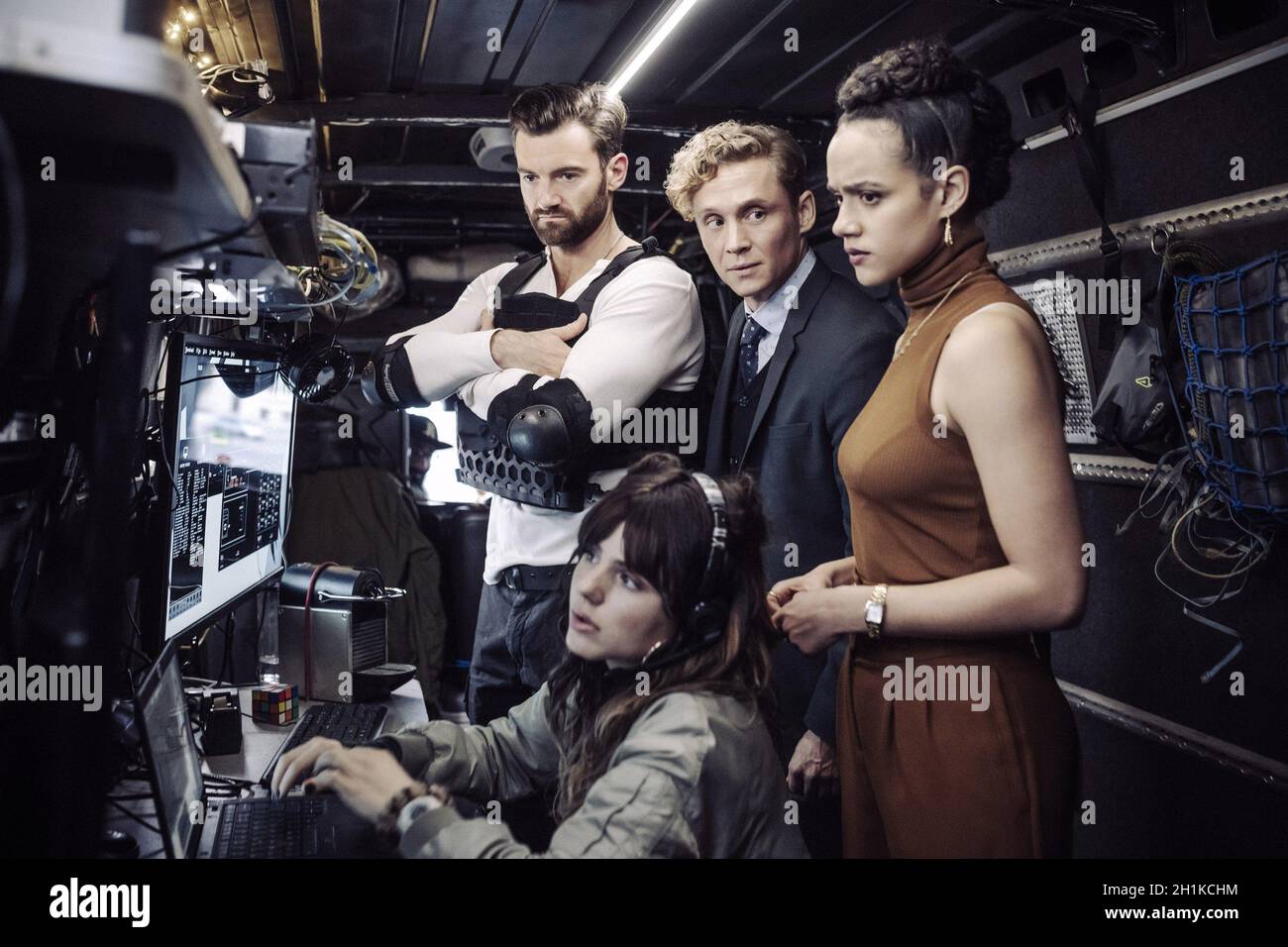 ARMY OF THIEVES, from left: Stuart Martin, Ruby O. Fee (sitting ...