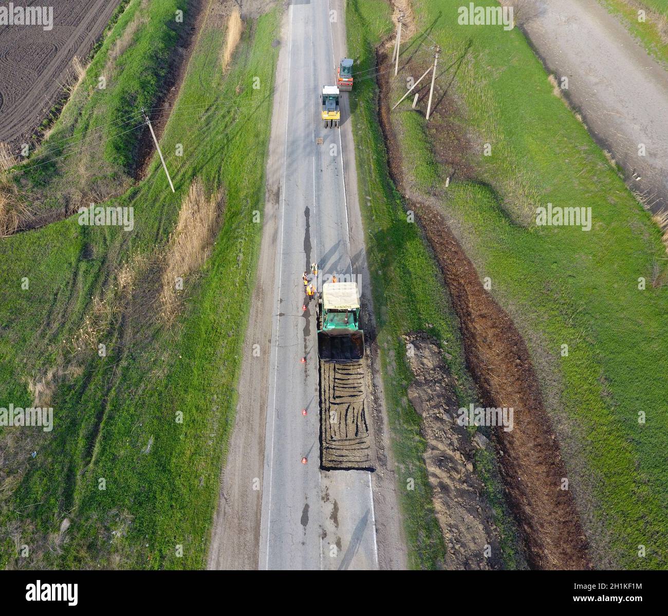 Top view of the road repair. Technics for repair of asphalt ...